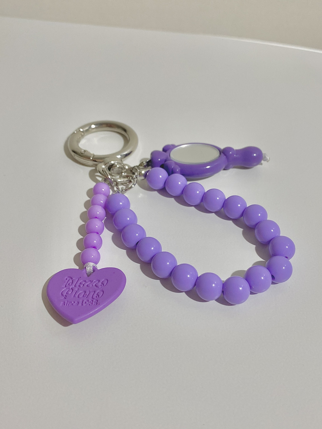 Light purple mirror keyring