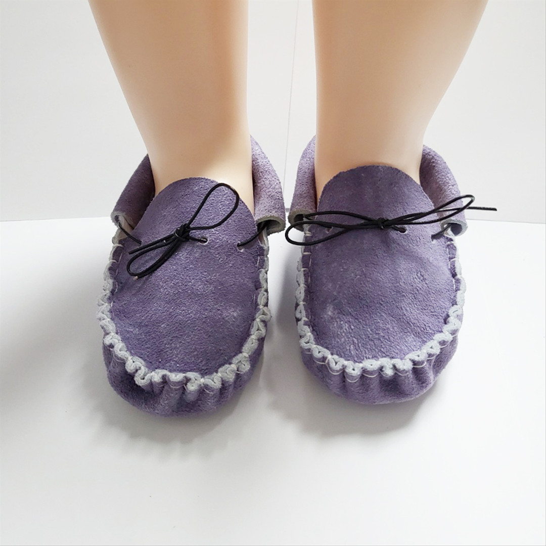 The first hand-made violet moccasin