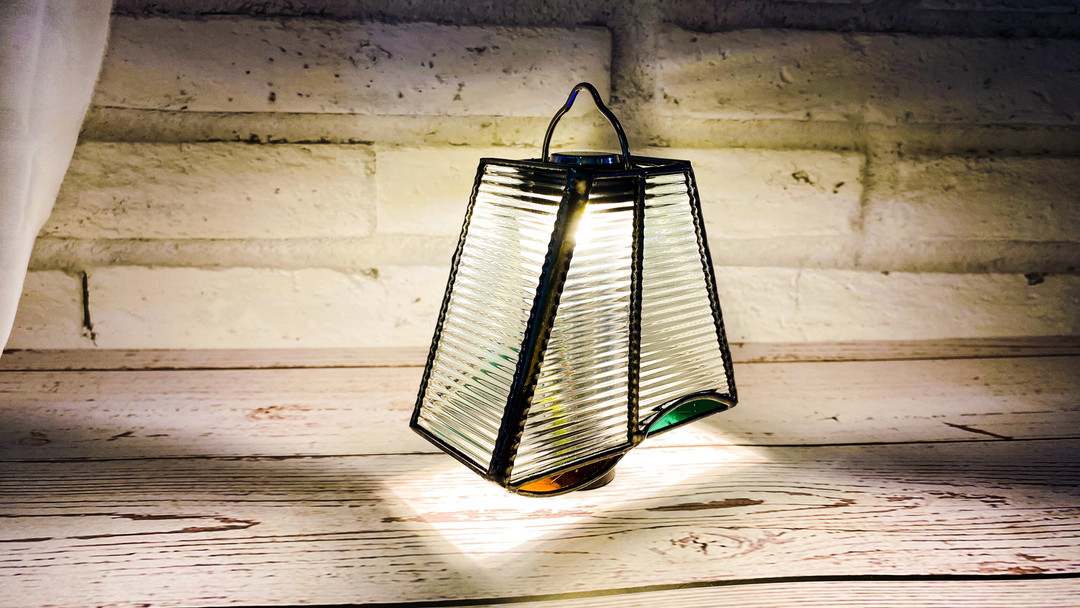 A transparent stripe patterned lamp shade designed for Goal Zero lantern.