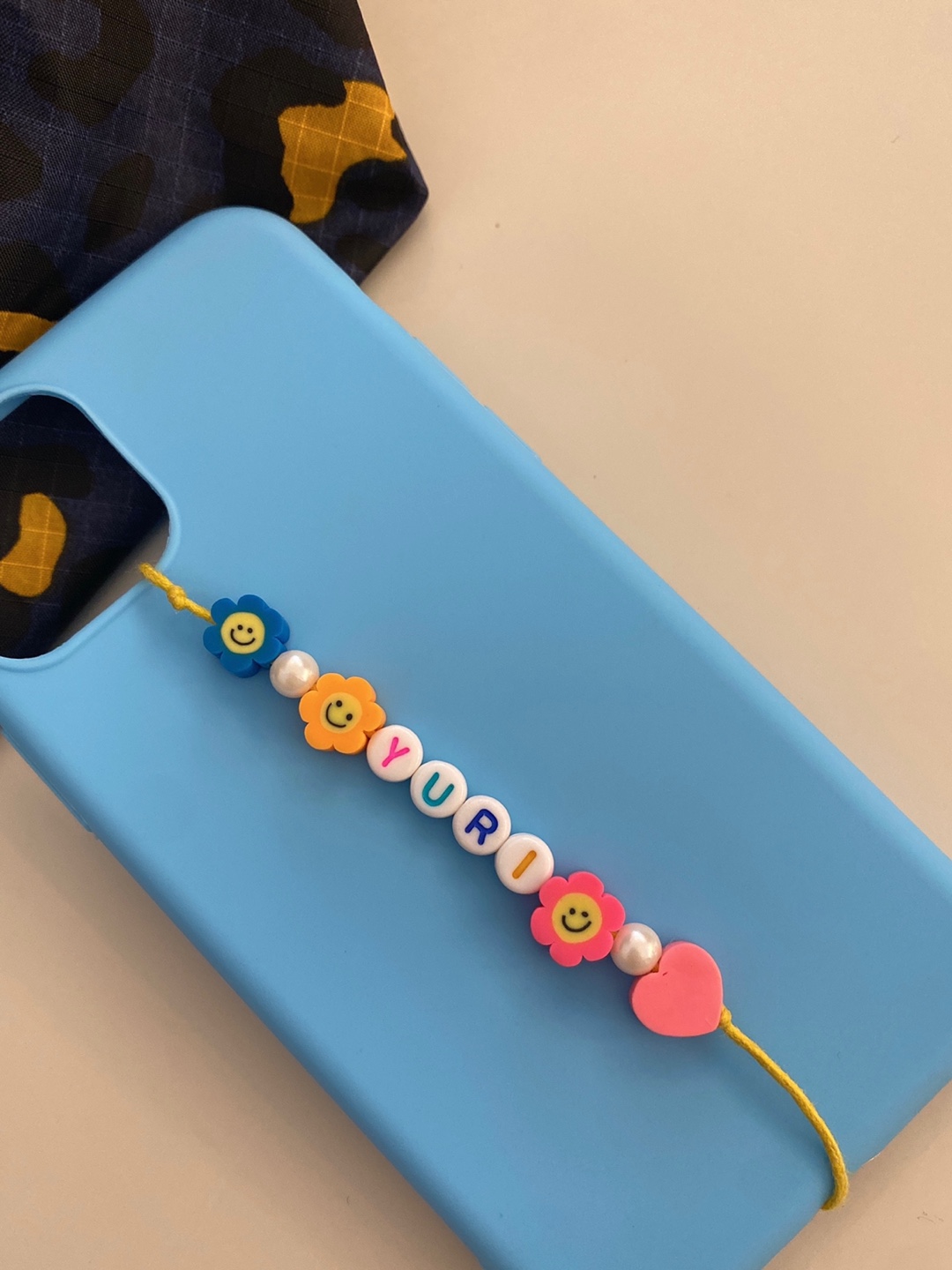 Custom smile flower Cell phone finger strap | idus